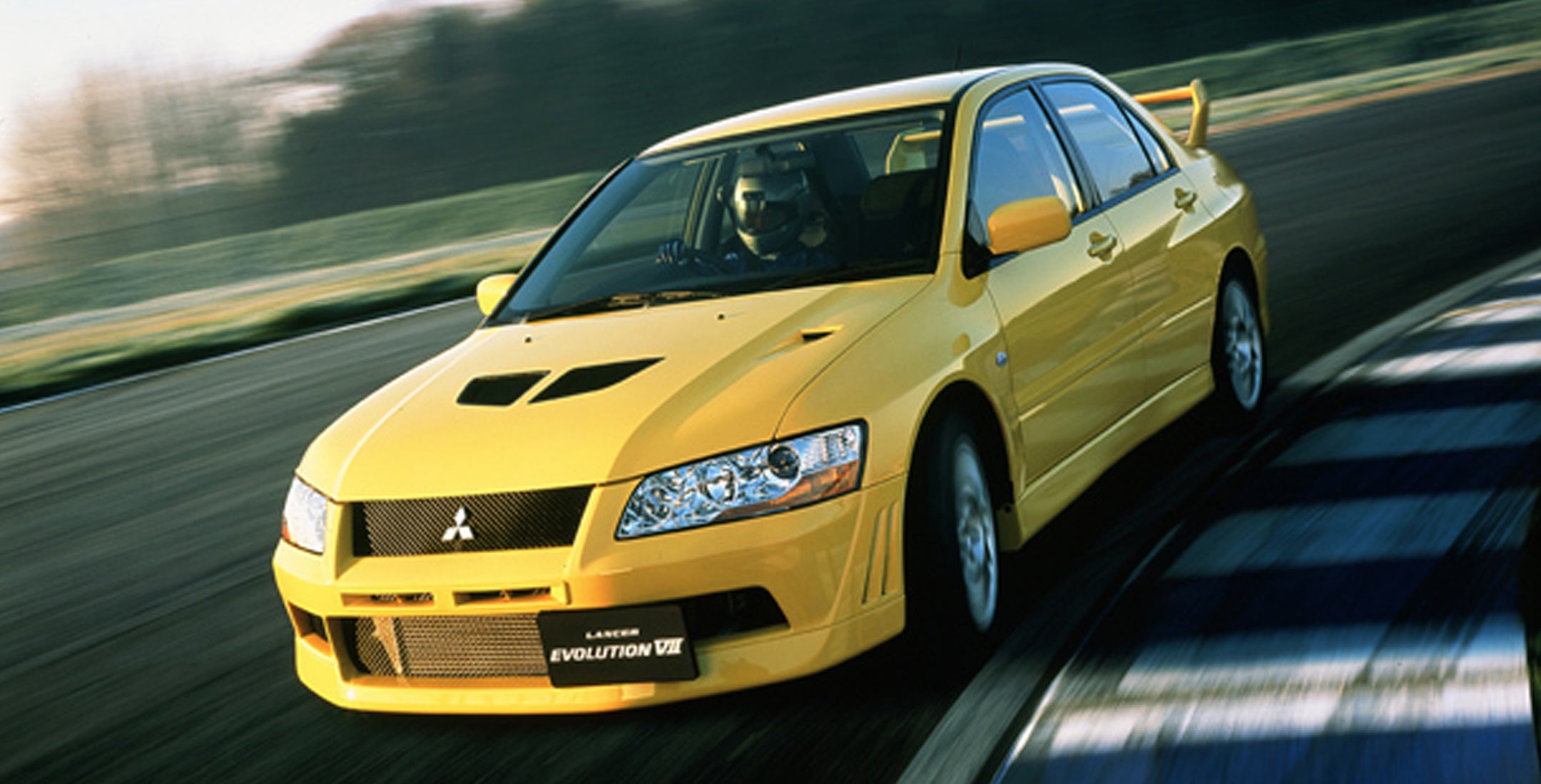 มิตซูบิชิ Lancer Evolution VII - ความเป็นมา | มิตซูบิชิ มอเตอร์ส ประเทศไทย